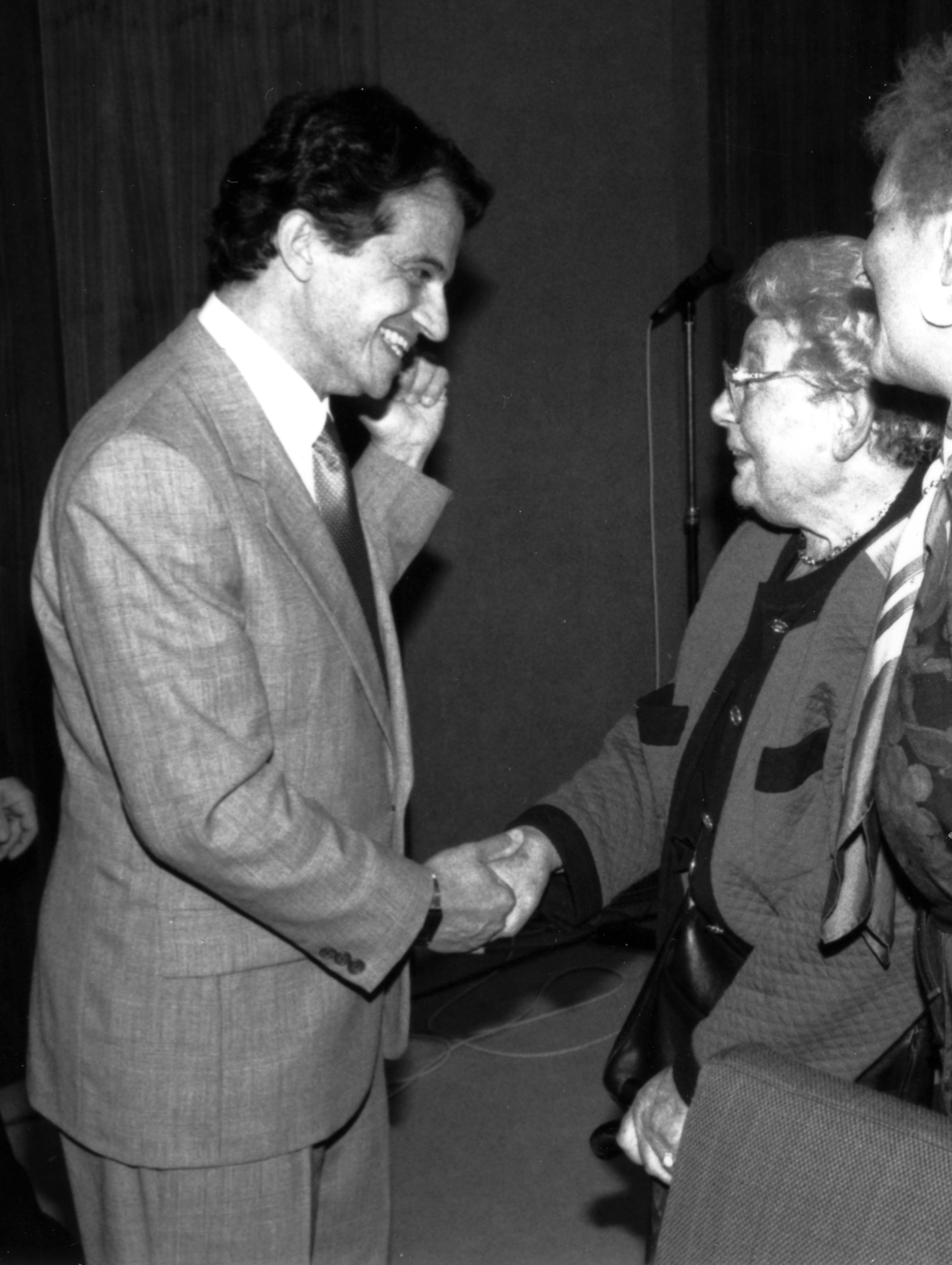 Madeleine Barot congratulates Pierre Sauvage